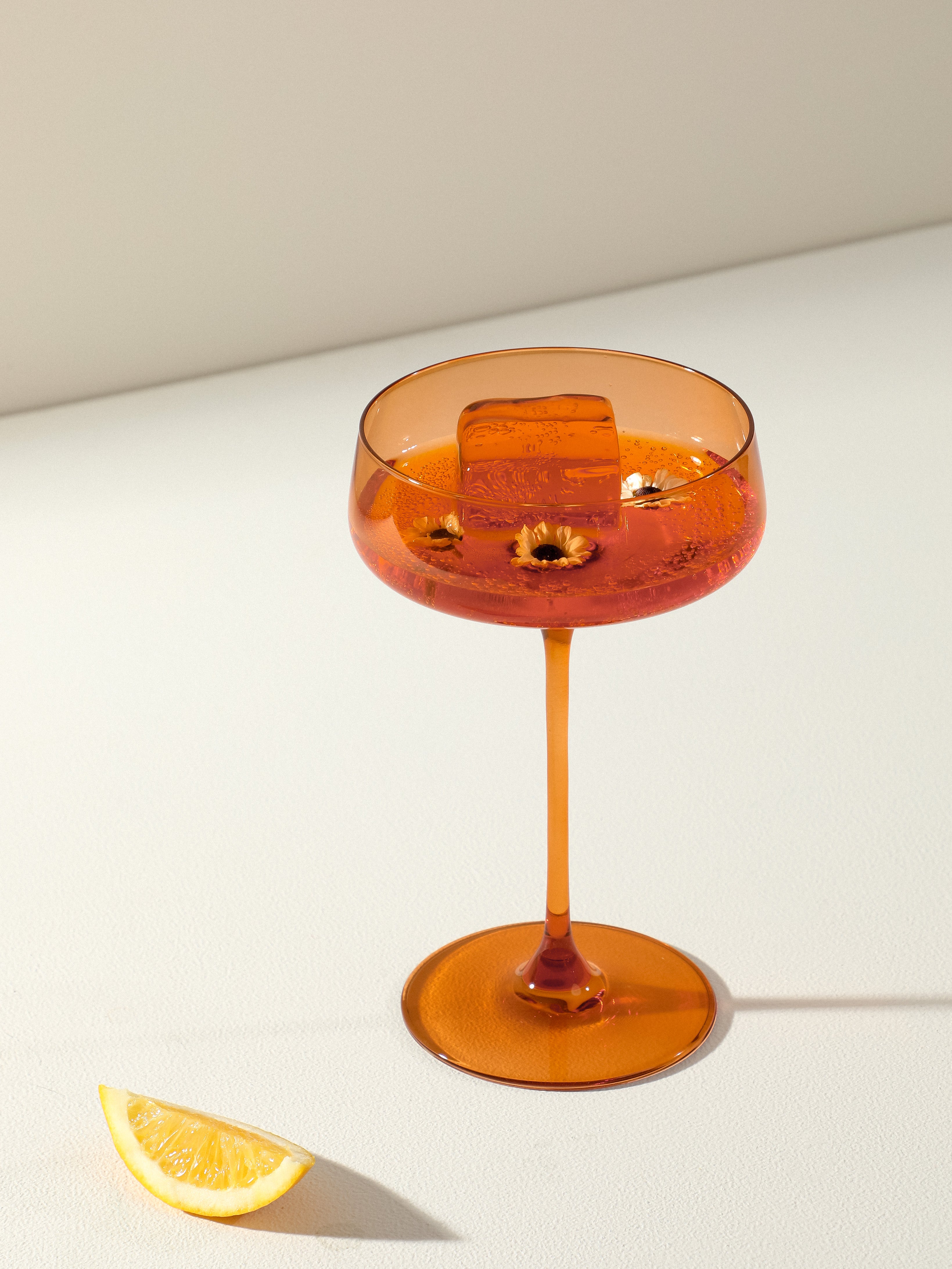 Buy the Stylish Sundowner Orange Coupe at Rayt India